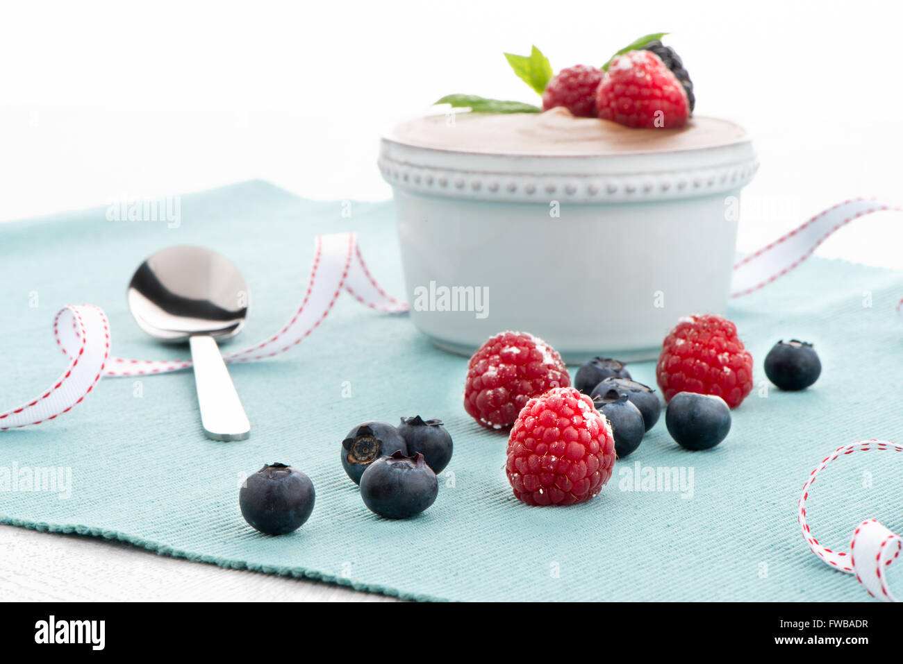 Chocolate mousse and red fruits Stock Photo - Alamy