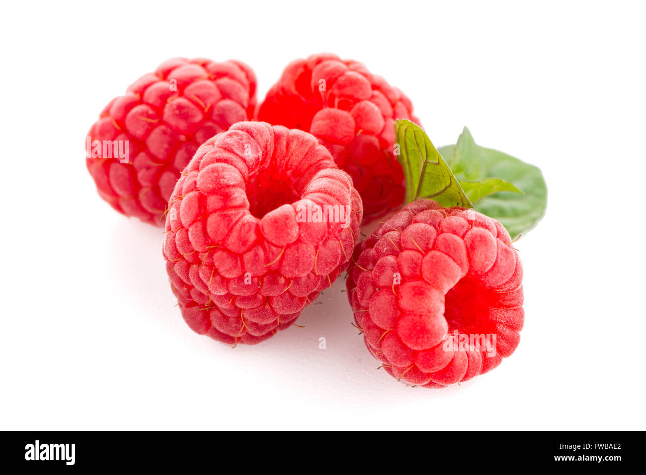 Raspberry fruit isolated over white background Stock Photo - Alamy