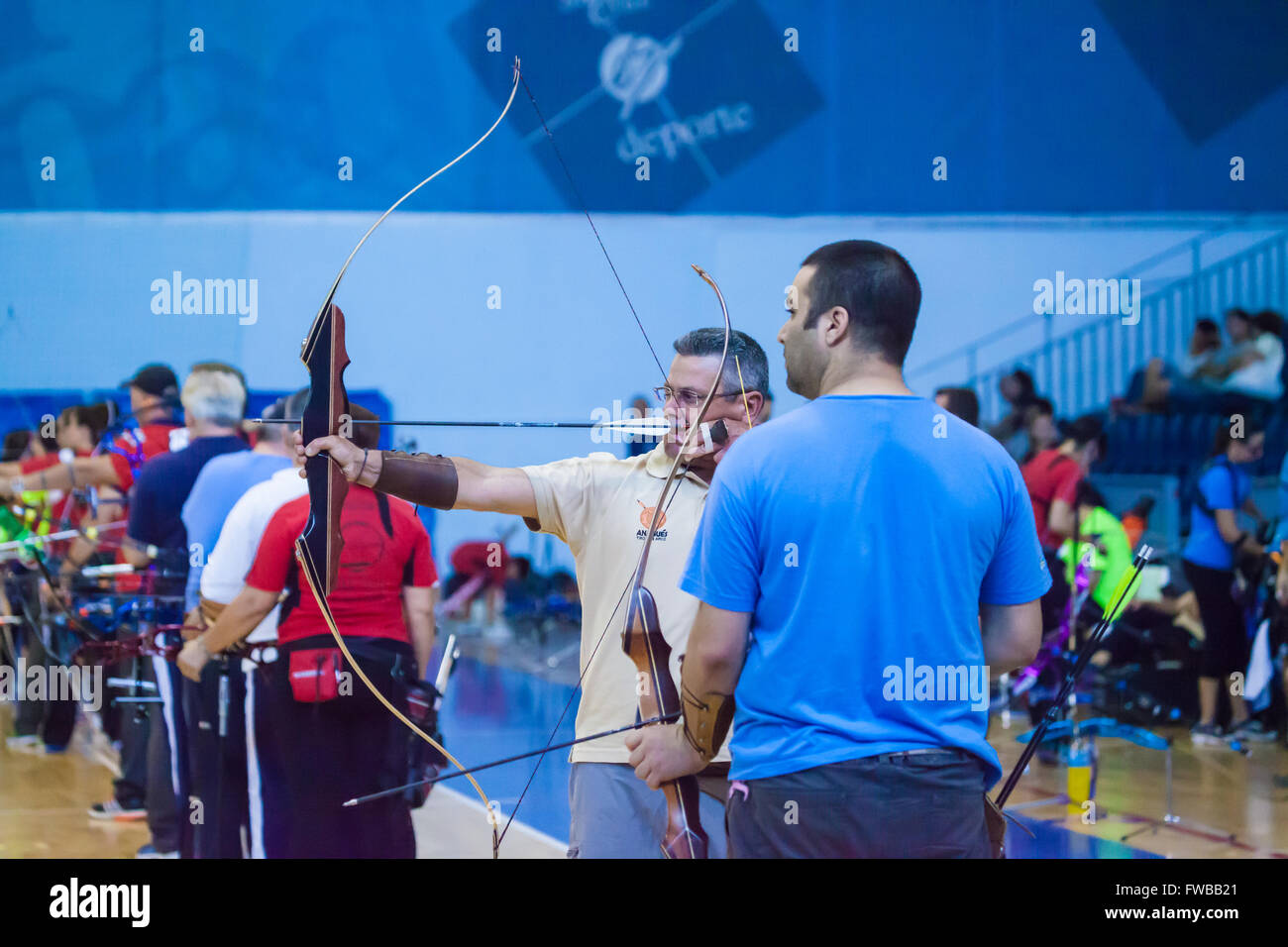 indoors archery match Stock Photo - Alamy