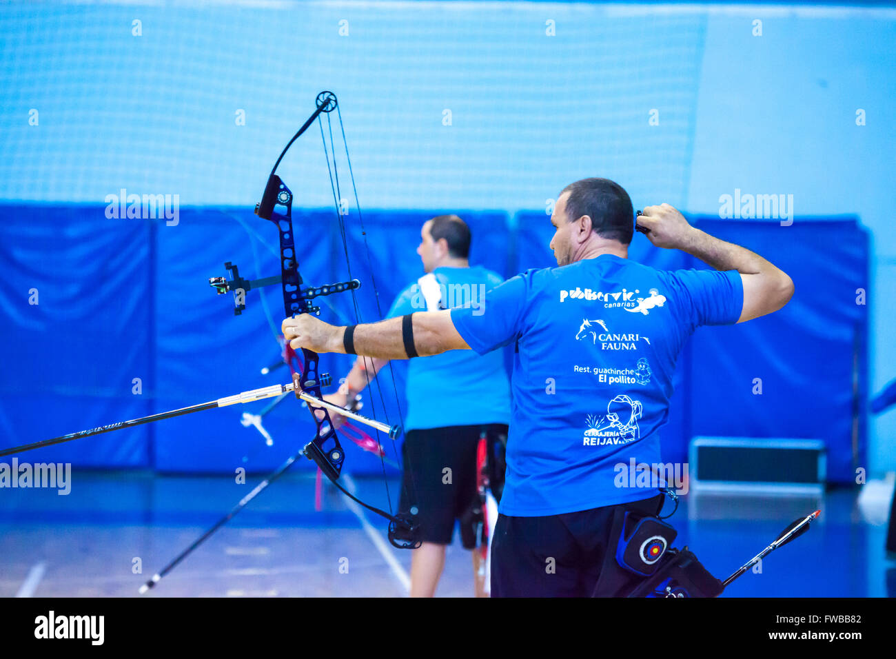 indoors archery match Stock Photo - Alamy