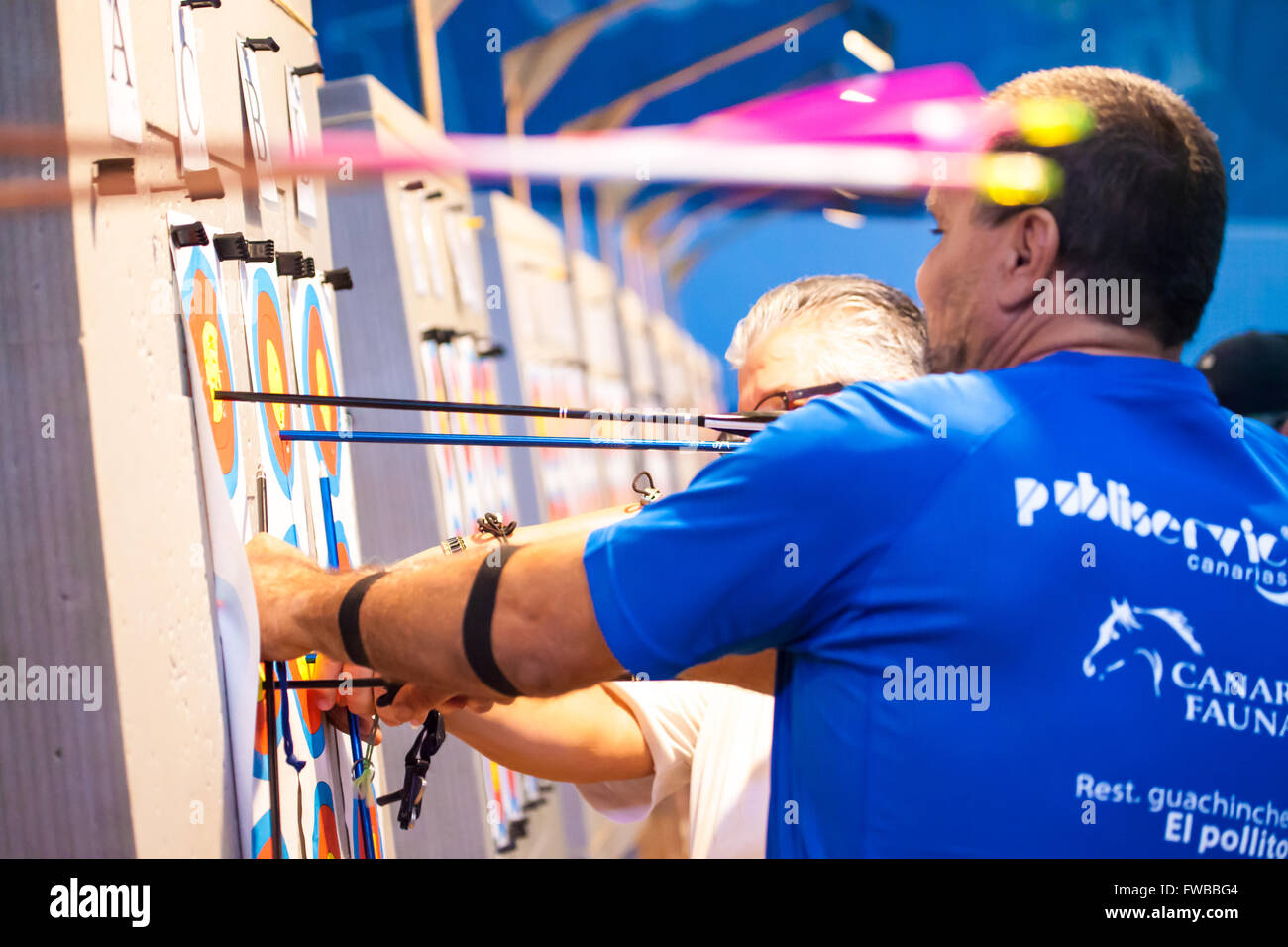 indoors archery match Stock Photo - Alamy