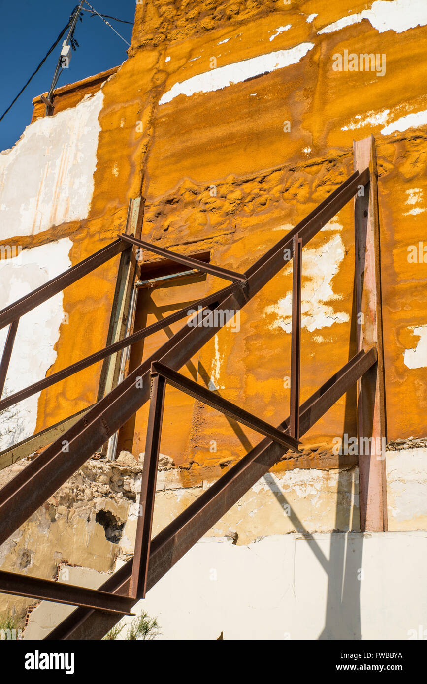 Building under restoration propped with a large metal structure Stock ...