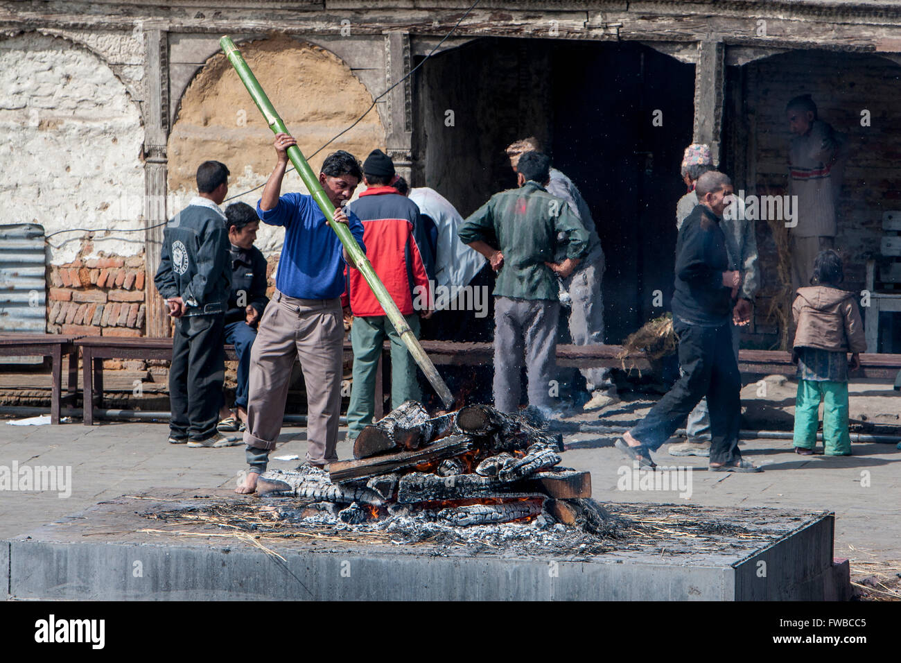 Nepal, Pashupatinath. Cremation Stages. Stirring the Remains after ...