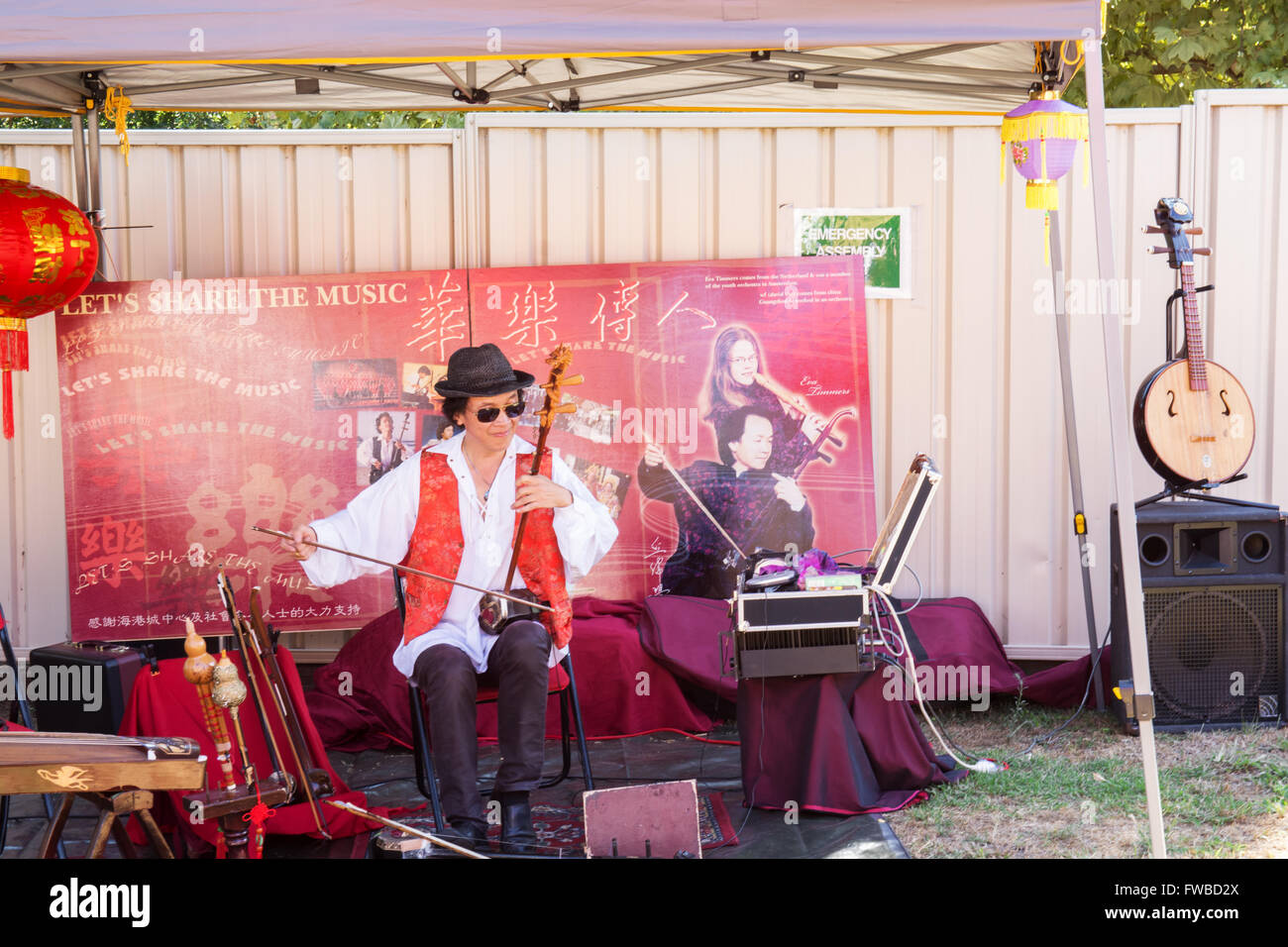 A Female Busker Playing a String Instrument at Nundle's Chinese Easter ...