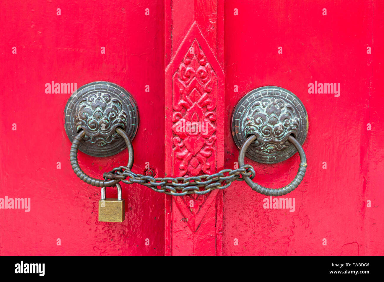 Chain red wood door lock secure detail hi-res stock photography and ...
