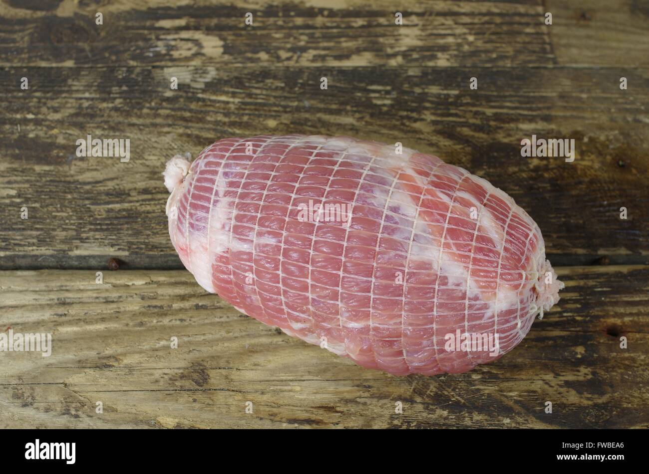 raw ham on wooden board Stock Photo - Alamy