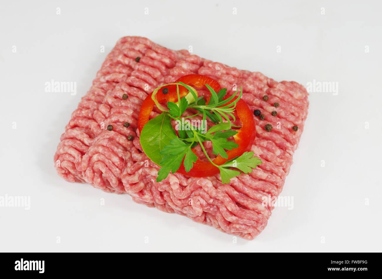 raw minced meat with onion and rosemary Stock Photo - Alamy