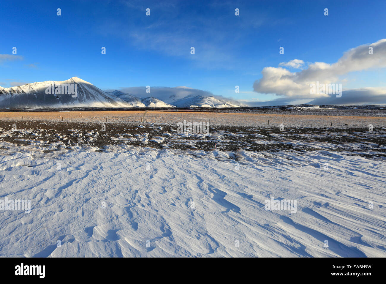 Winter snow over the Lava fields, Skardsheidi mountains near Borgarnes ...