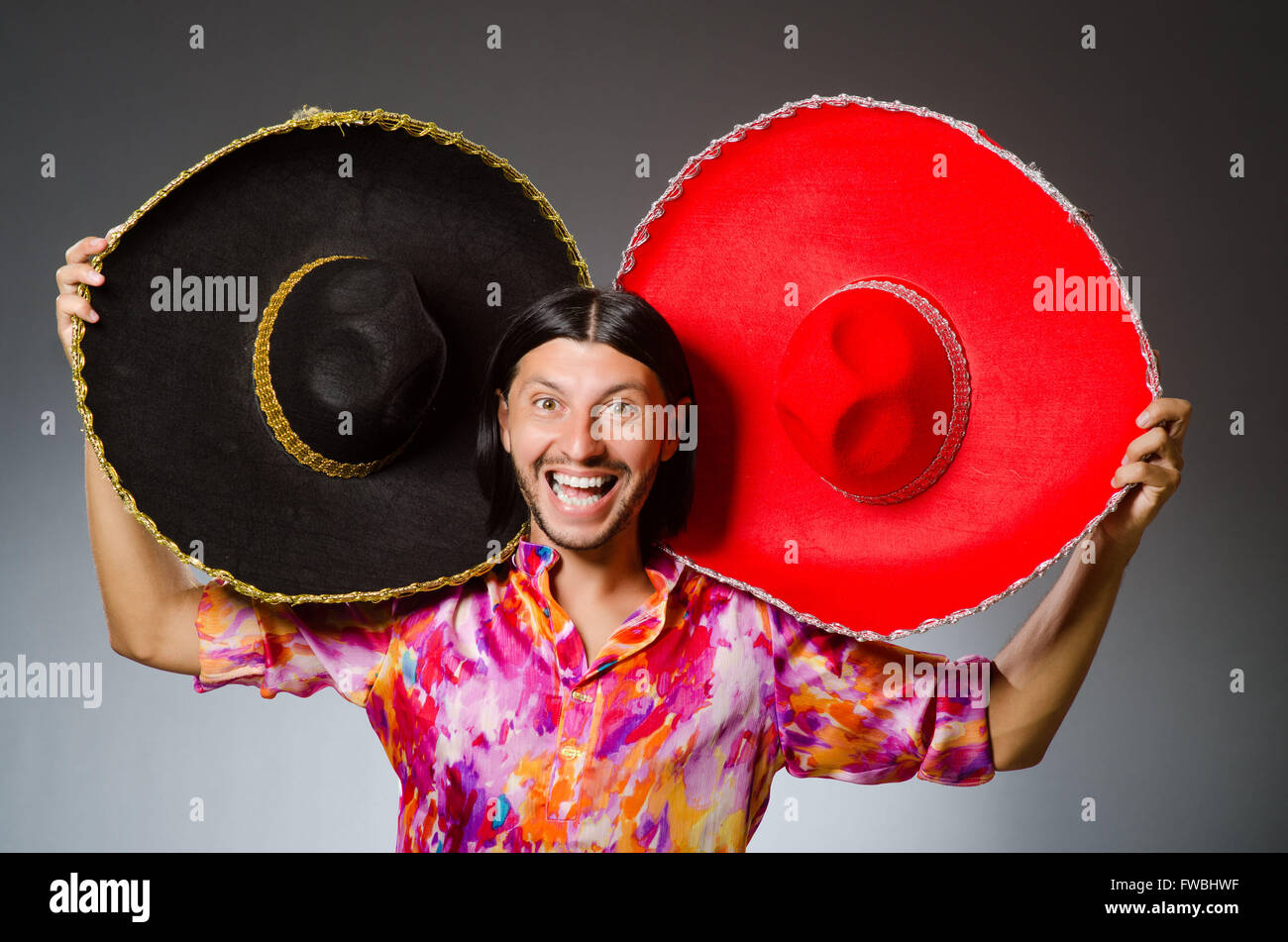 Young mexican man wearing sombrero Stock Photo - Alamy