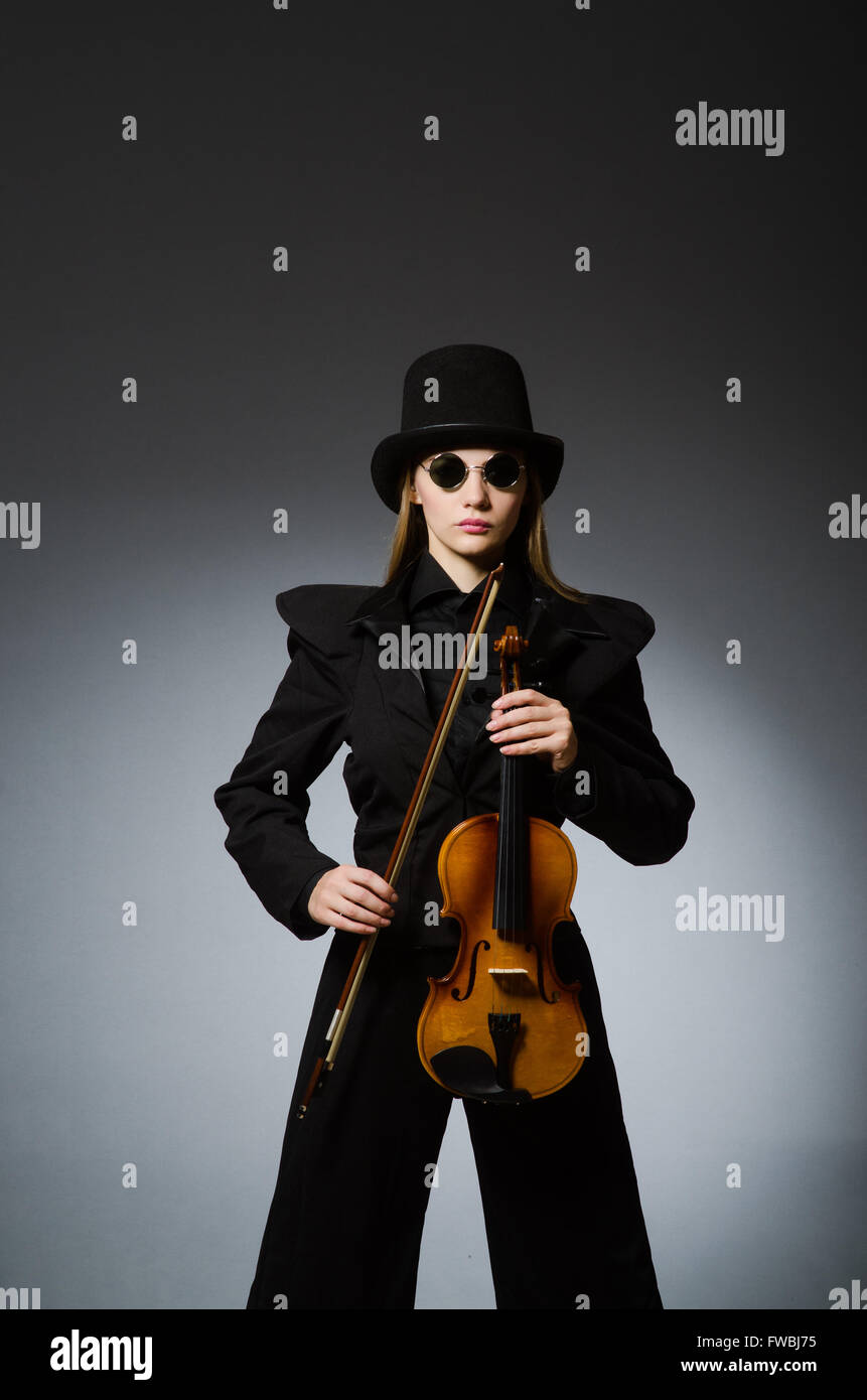 Woman in musical art concept Stock Photo - Alamy