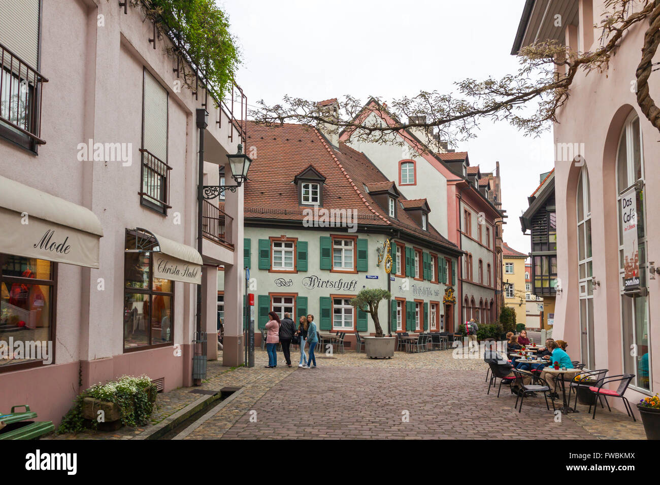 FREIBURG im BREISGAU, GERMANY - MAY 1, 2013: Old town street in Freiburg im Breisgau, a city in ...