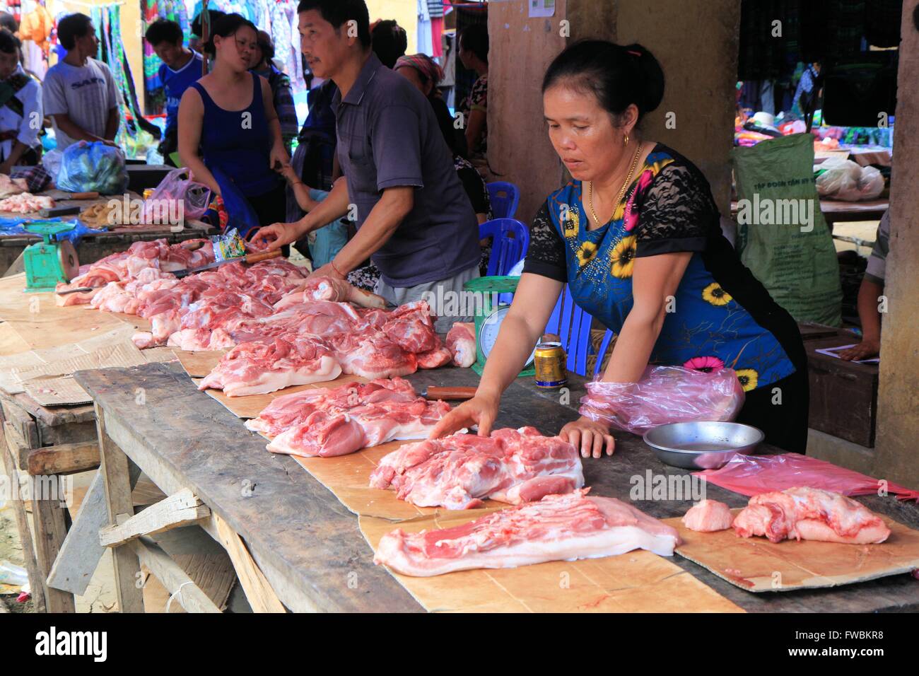 Woman selling meat hi-res stock photography and images - Alamy