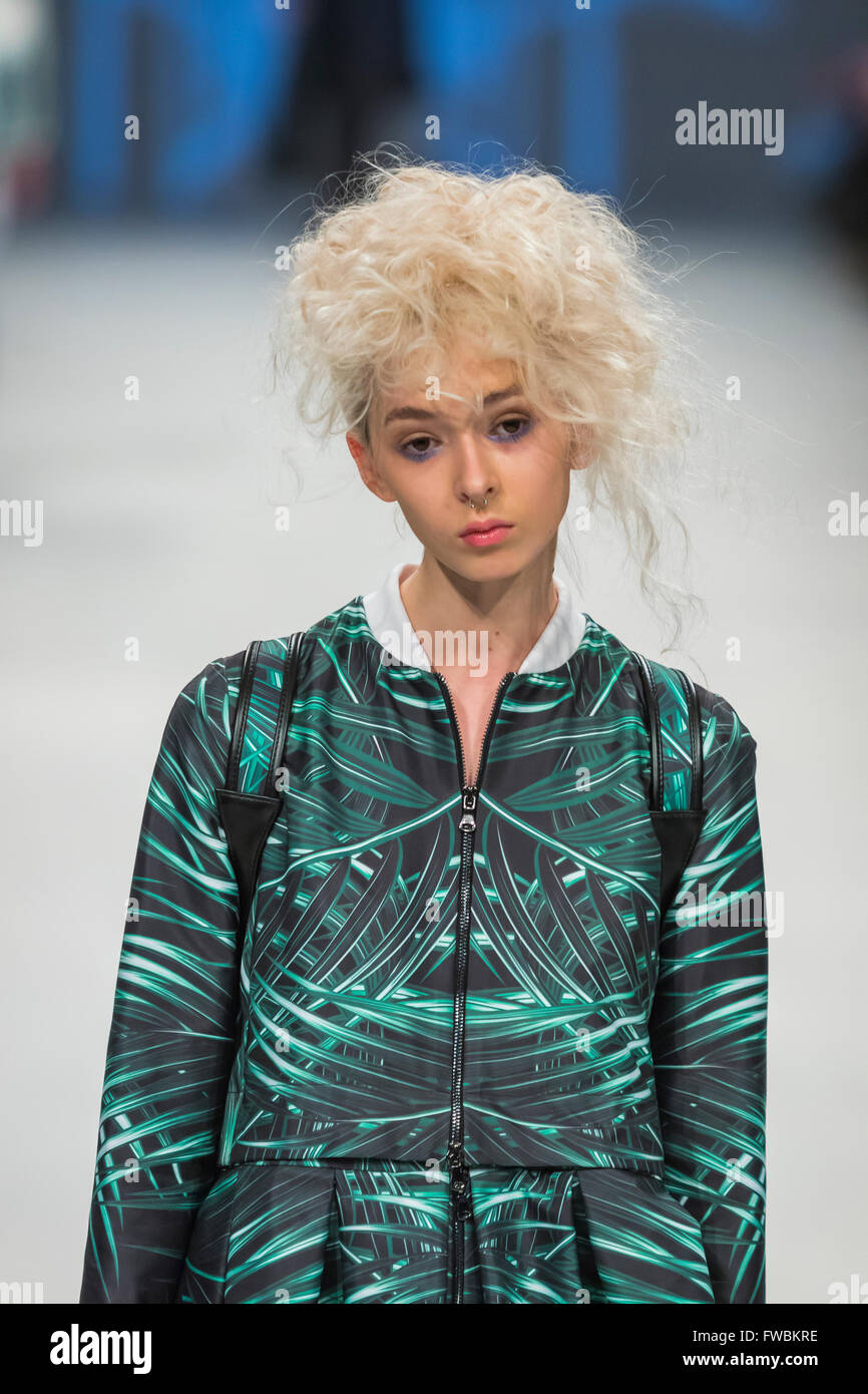 KYIV, UKRAINE - MARCH 21, 2016: Models walk on the catwalk during ...