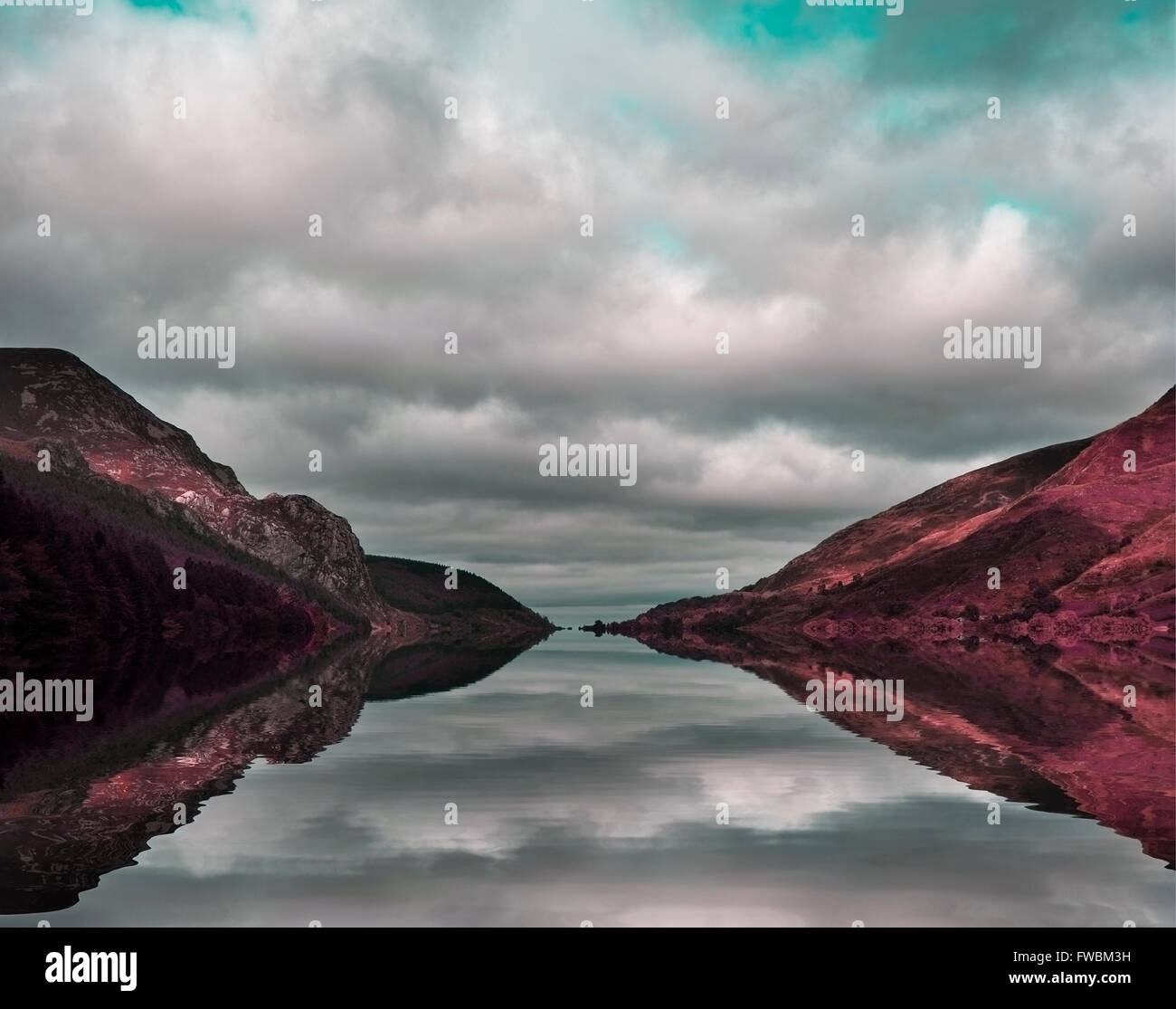 Stunning surreal color mountain landscape reflected in lake Stock Photo ...