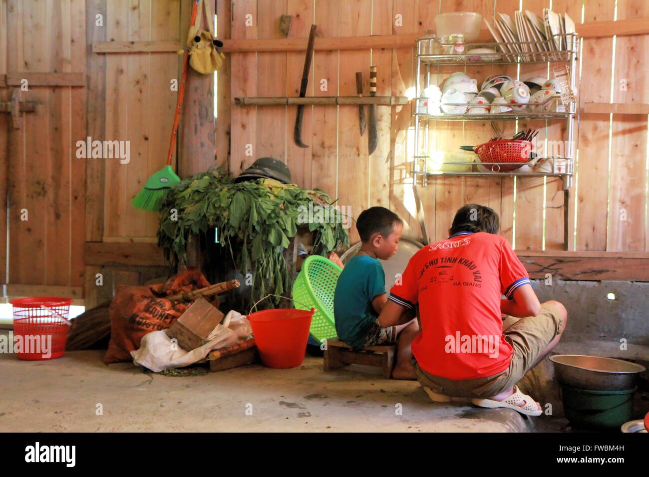 Hill-tribe family cooking meal Stock Photo - Alamy