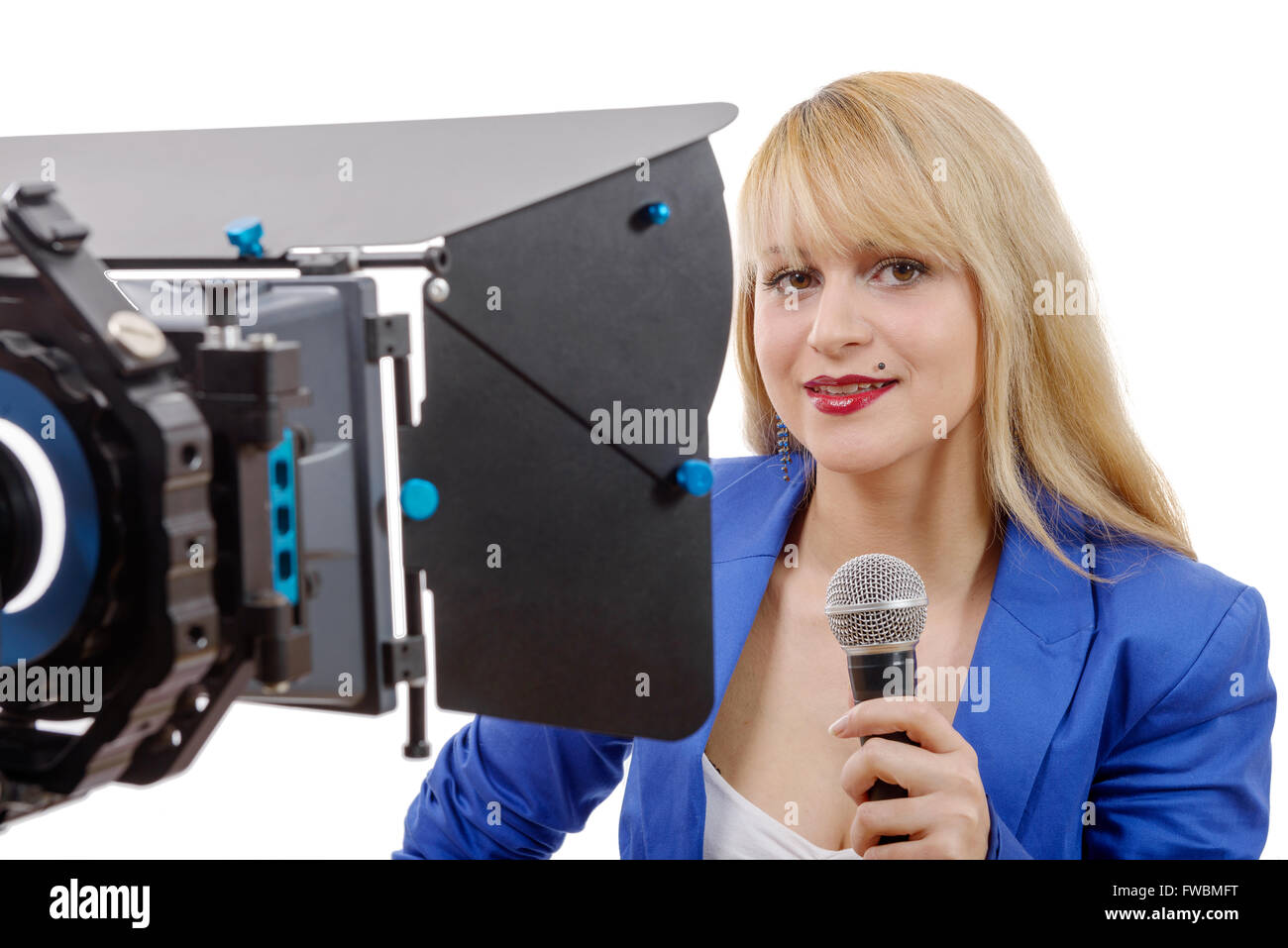 a portrait of elegant woman TV reporter , who is smiling and looking ...