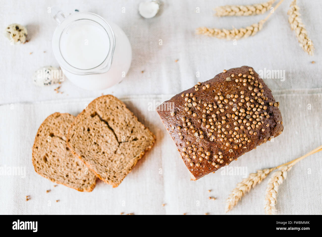 Sliced bread with fresh coriander and milk Stock Photo - Alamy