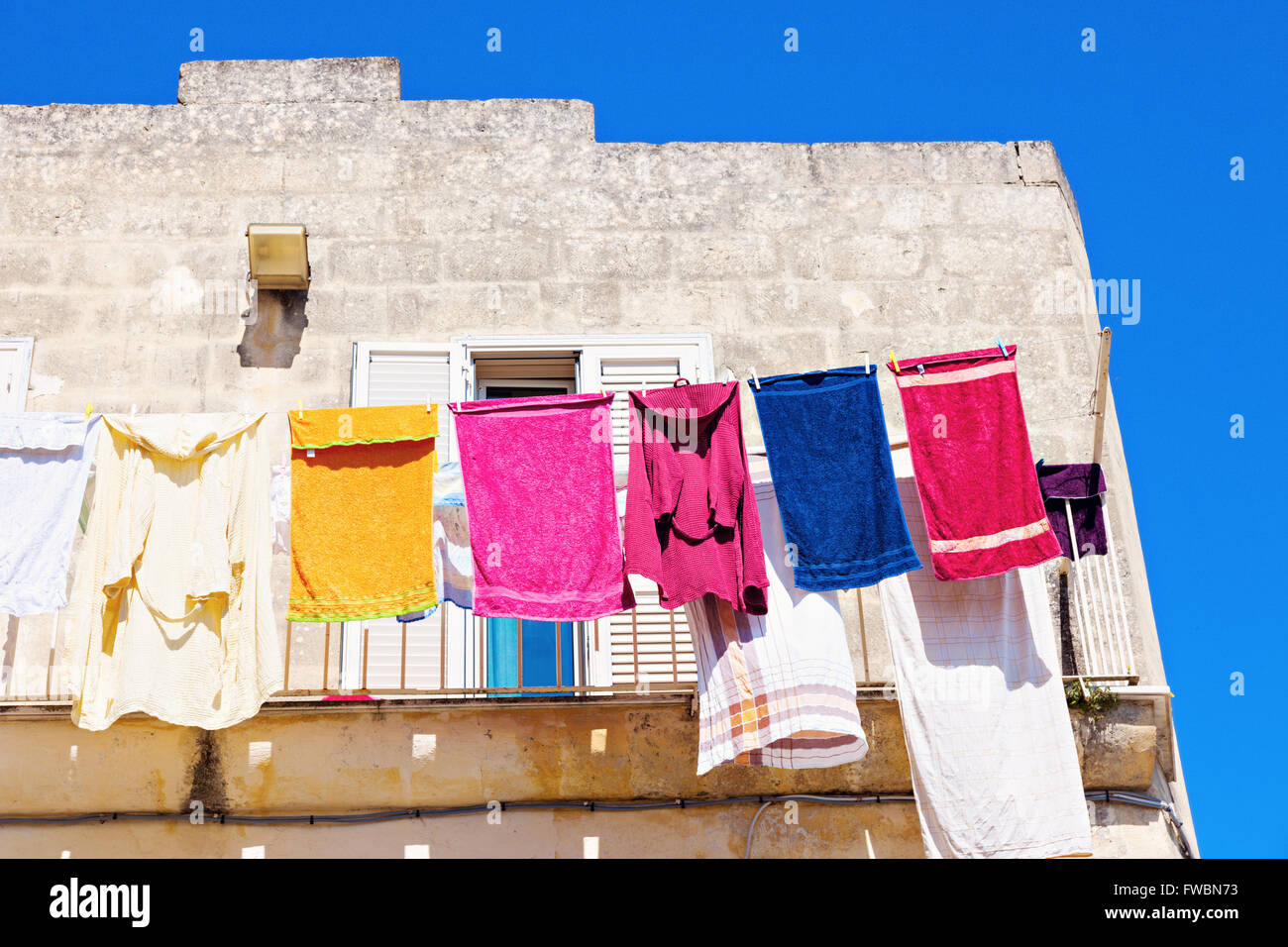 Laundry on the balcony - Sassi in Matera Stock Photo - Alamy