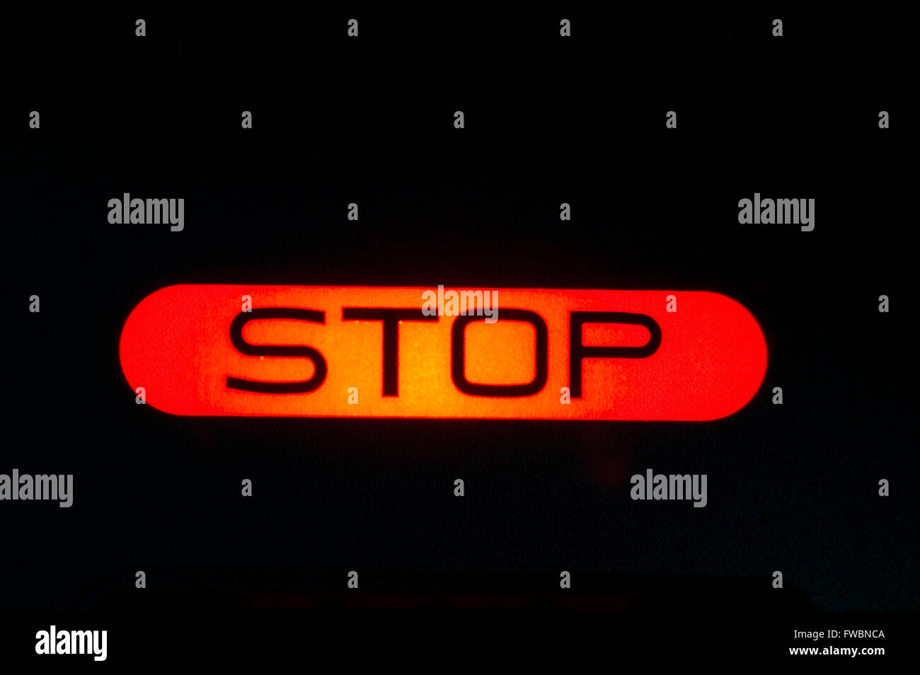 A car dash board display showing that the vehicle has stopped by the ...