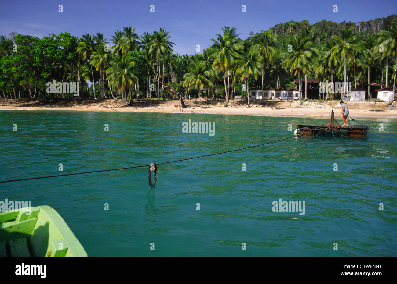 Sibu island off the coast of Malaysia and holiday makers need to board ...