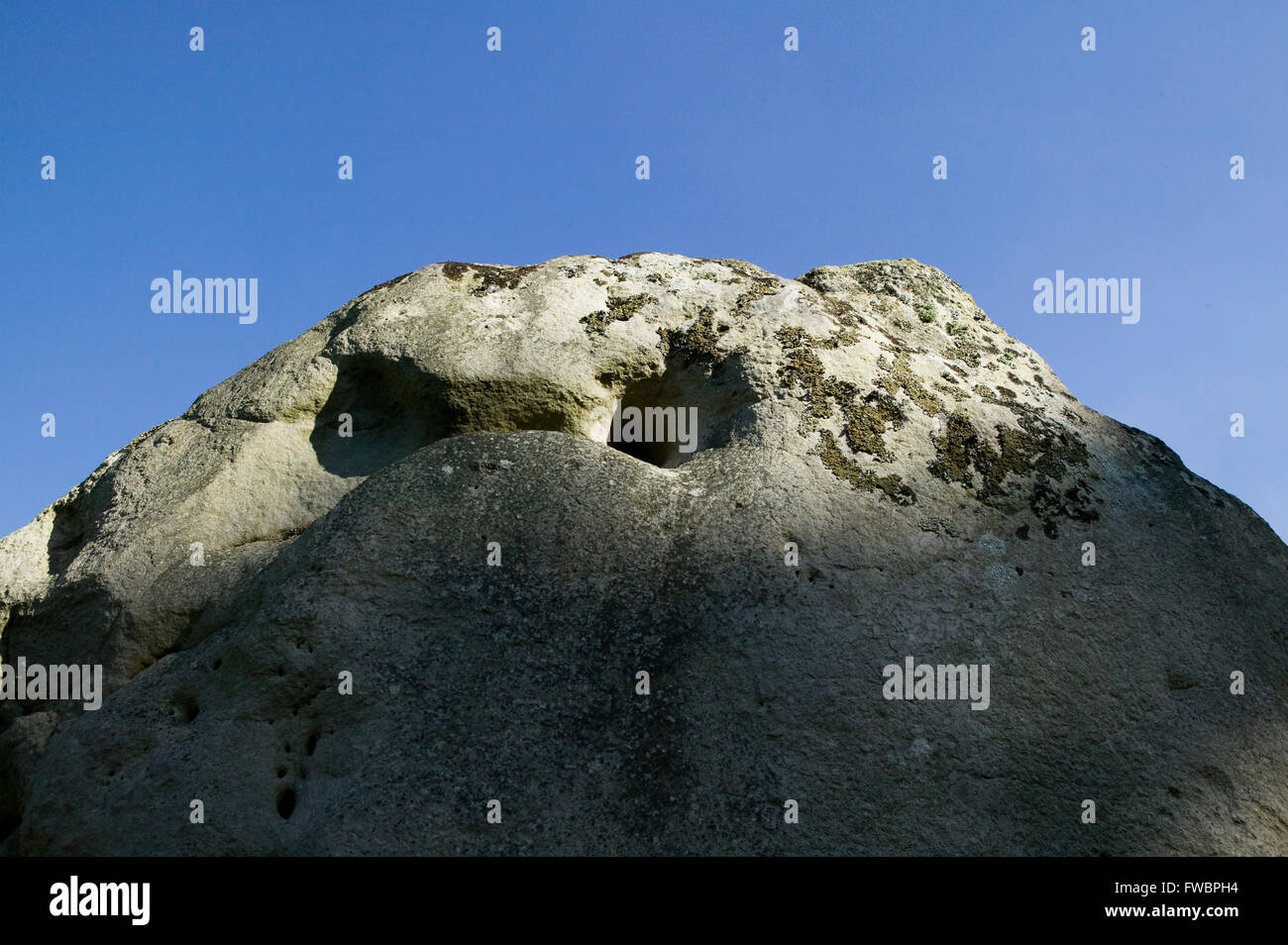A close up image of one of the neolithic stones at the stone circle in ...