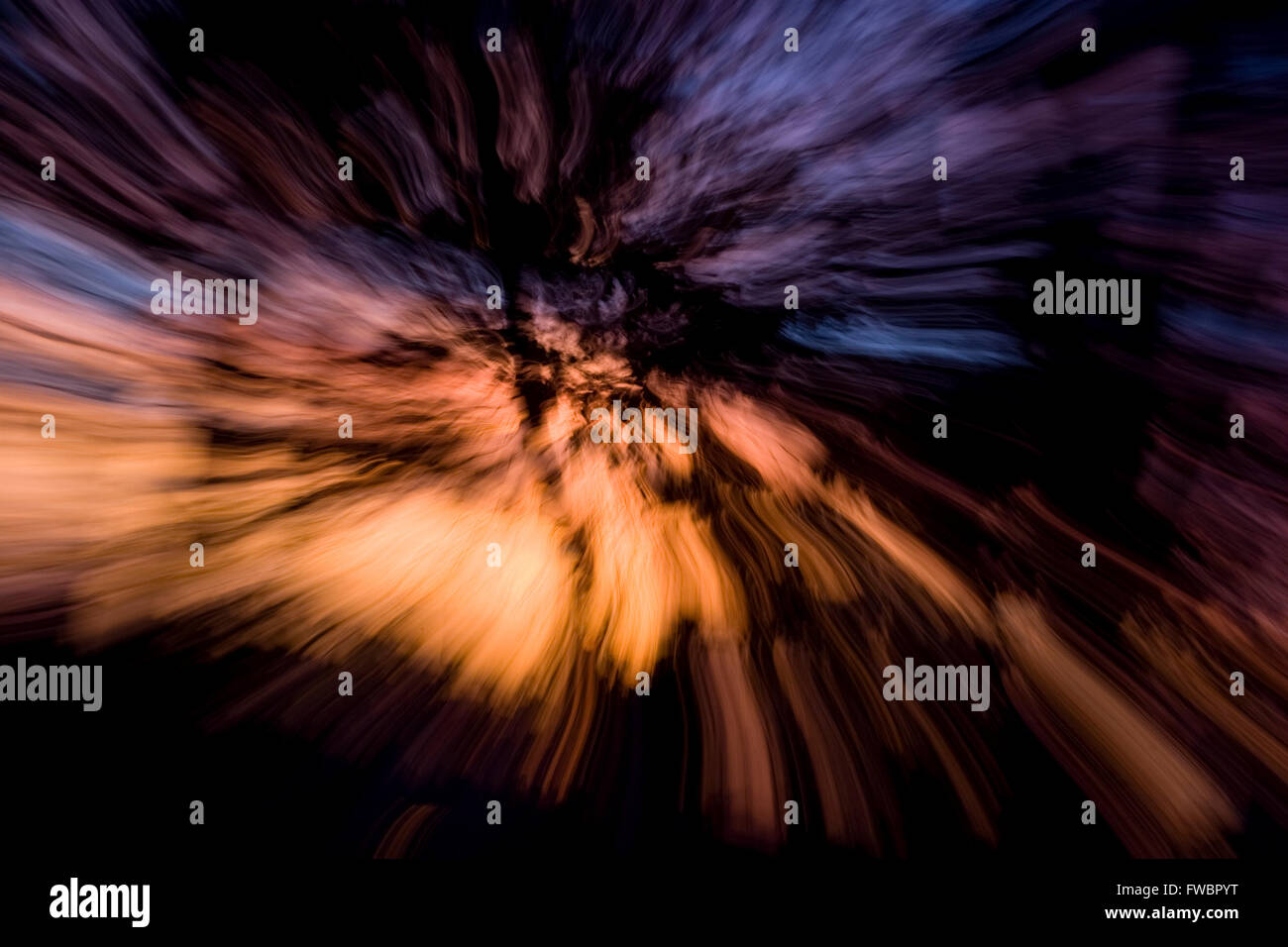 Swirling patterns of light are created by a sunset viewed frominside a ...