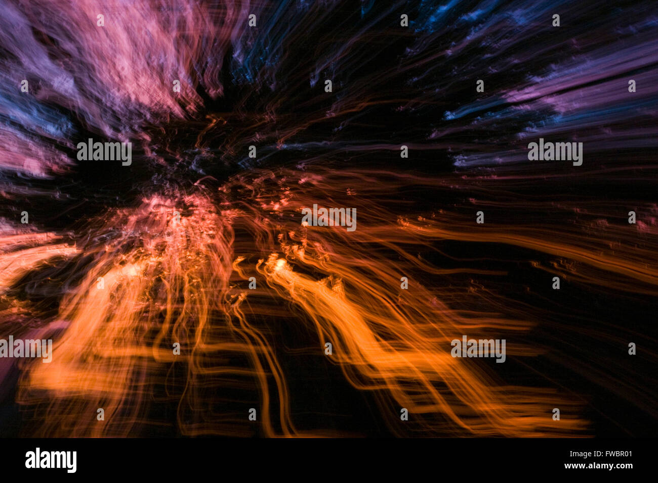 Swirling patterns of light are created by a sunset viewed frominside a ...
