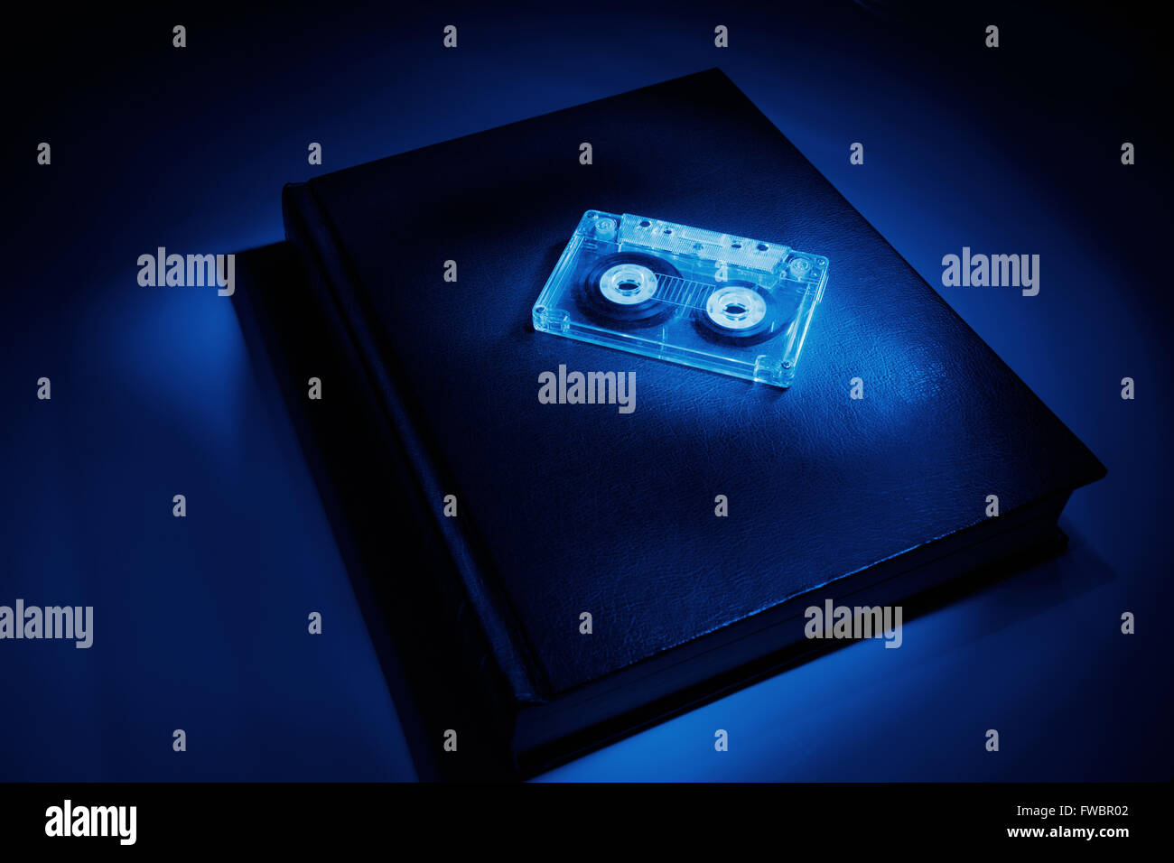 book and a cassette, music education concept Stock Photo - Alamy