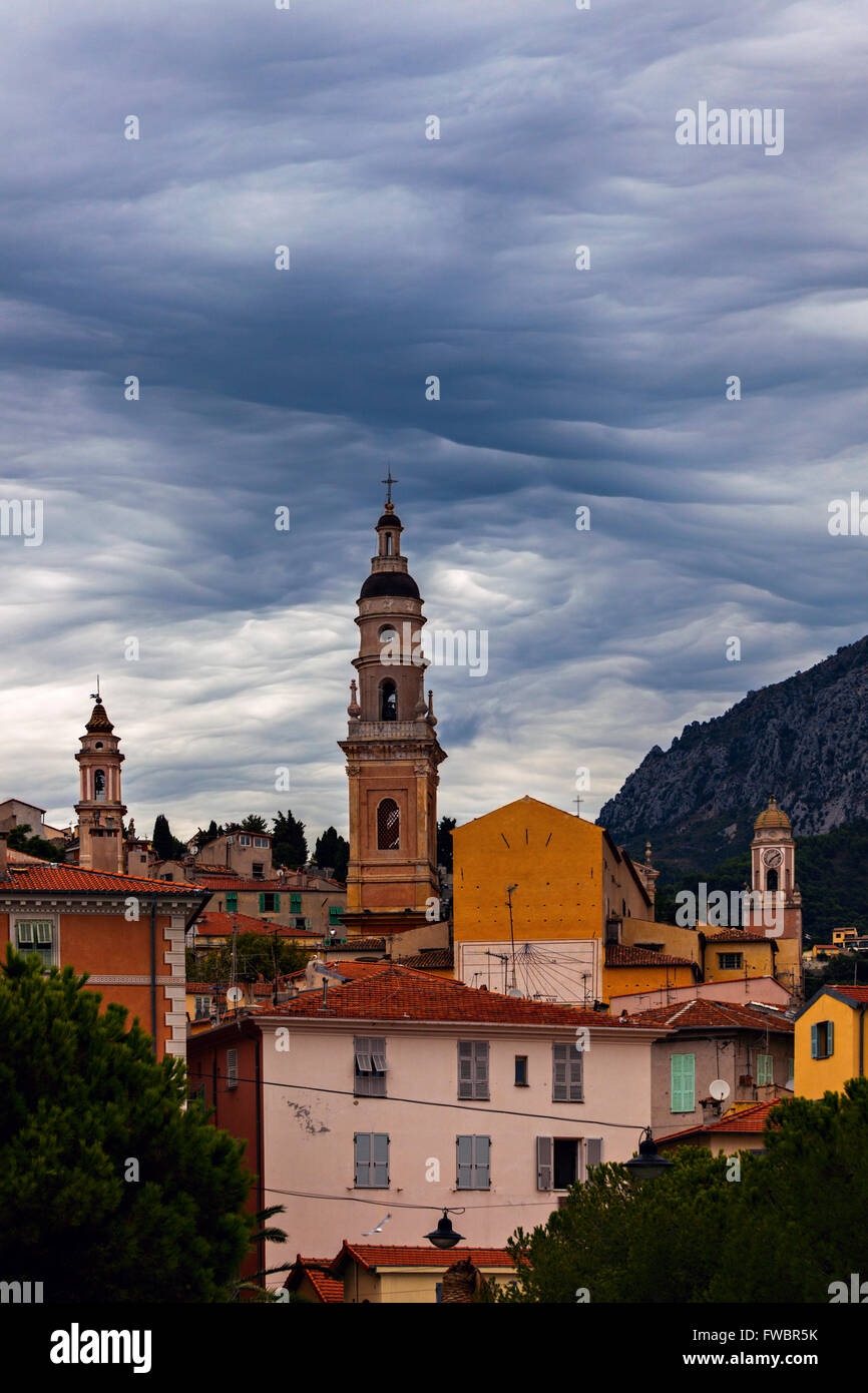 Saint Michel Basilica in Menton under dramatic sky Stock Photo - Alamy
