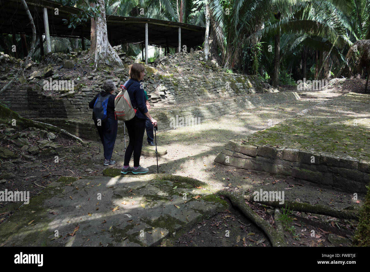 Tourists at the ball court, Cancuen ruins, Guatemala Stock Photo - Alamy