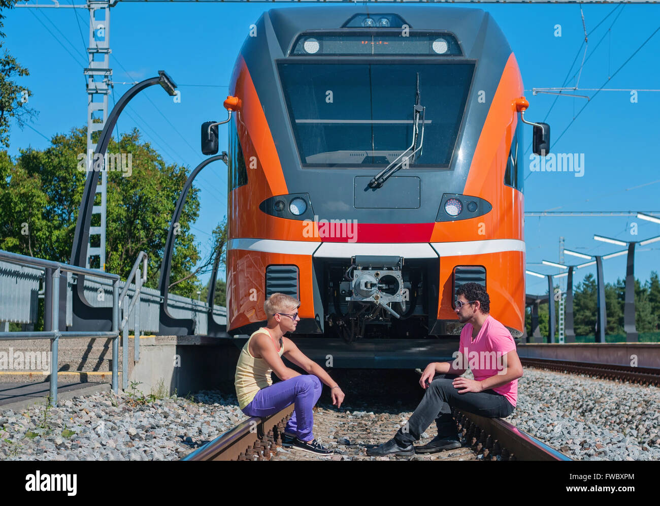 Two men sitting in train hi-res stock photography and images - Alamy