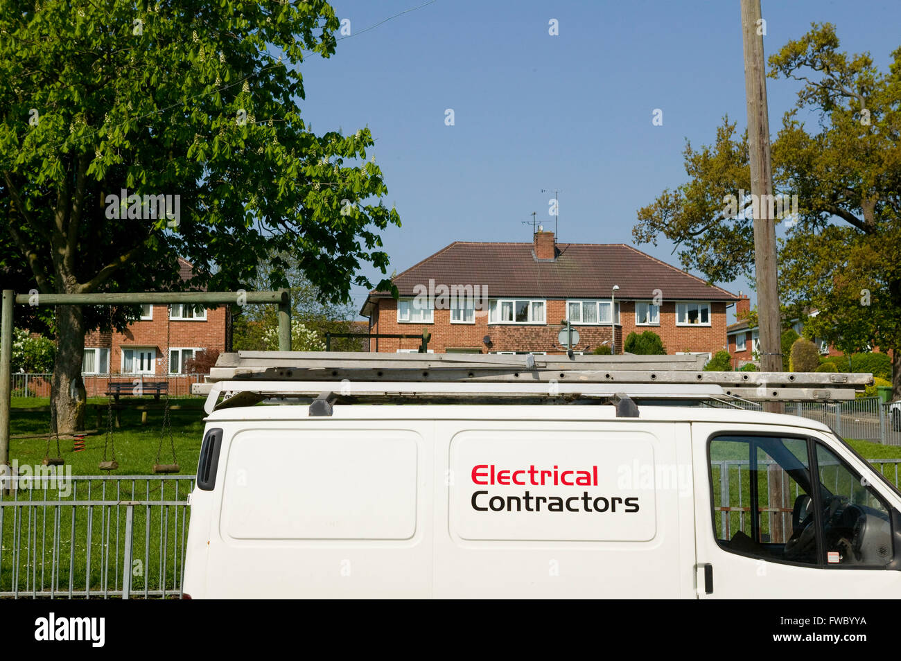 An Electrical Contractor's van parked on a typical housing estate after ...