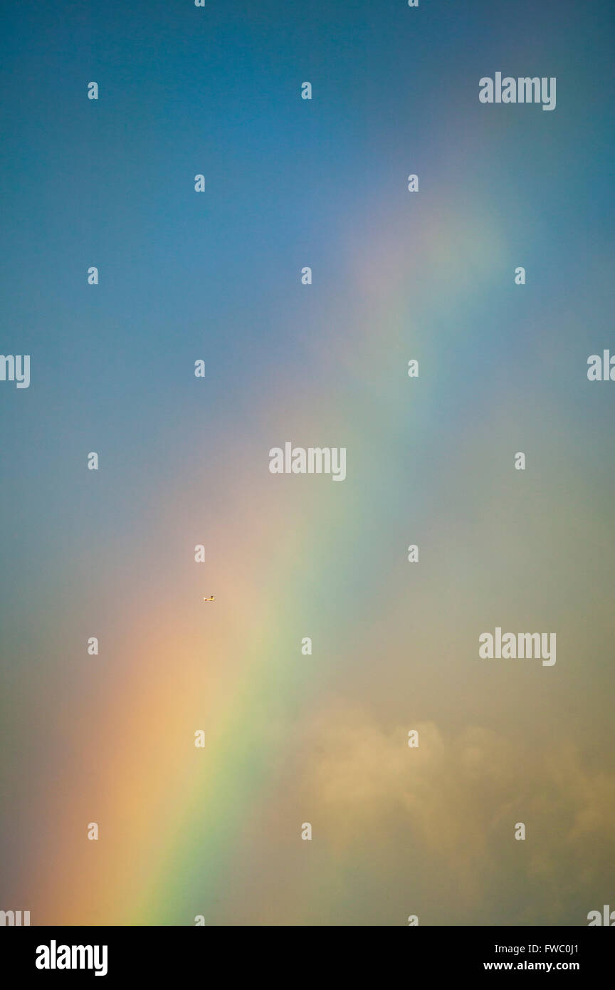Large rainbow ina blue sky Stock Photo - Alamy