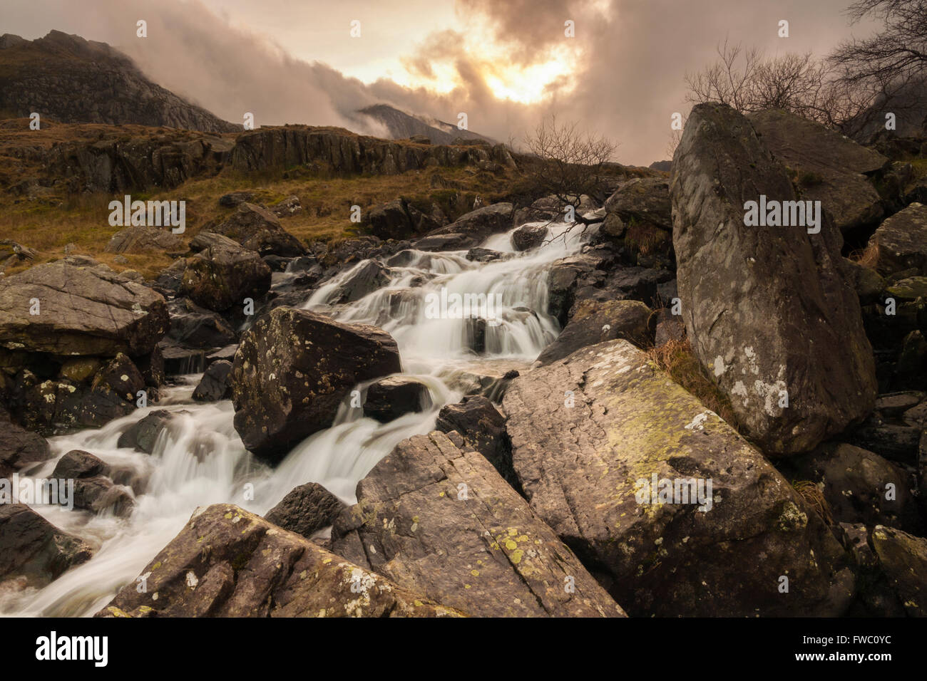 Mountain cascade at Cwm Idwal in the Glyderau range of mountains in ...