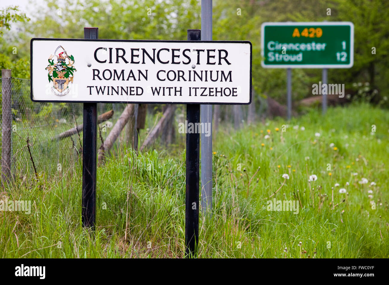 A road sign on the outskirts of town announcing the fact that one is ...