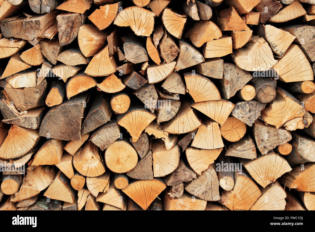 Stack of firewood Stock Photo - Alamy