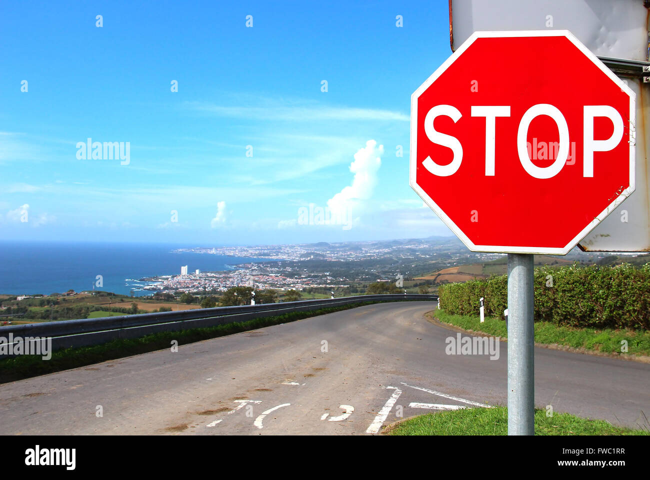 Stop sign on the empty road leading to Lagoa and Ponta Delgada, Sao ...