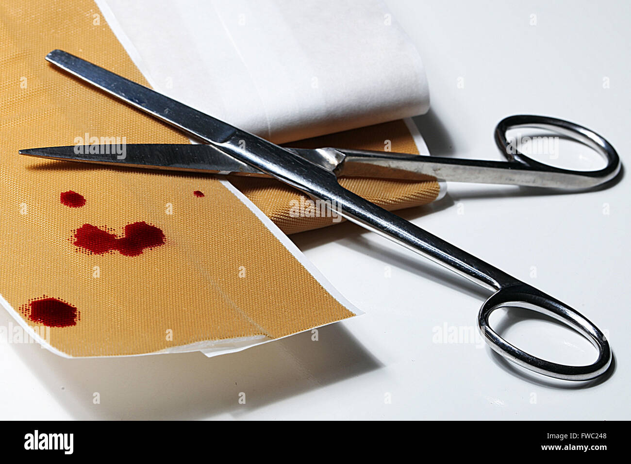 Blood spill, cutting pathes with scissors Stock Photo - Alamy