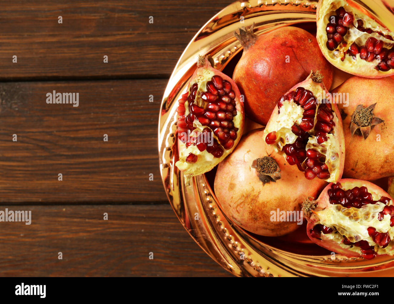 Organic ripe red fruit pomegranate, whole and broken Stock Photo - Alamy