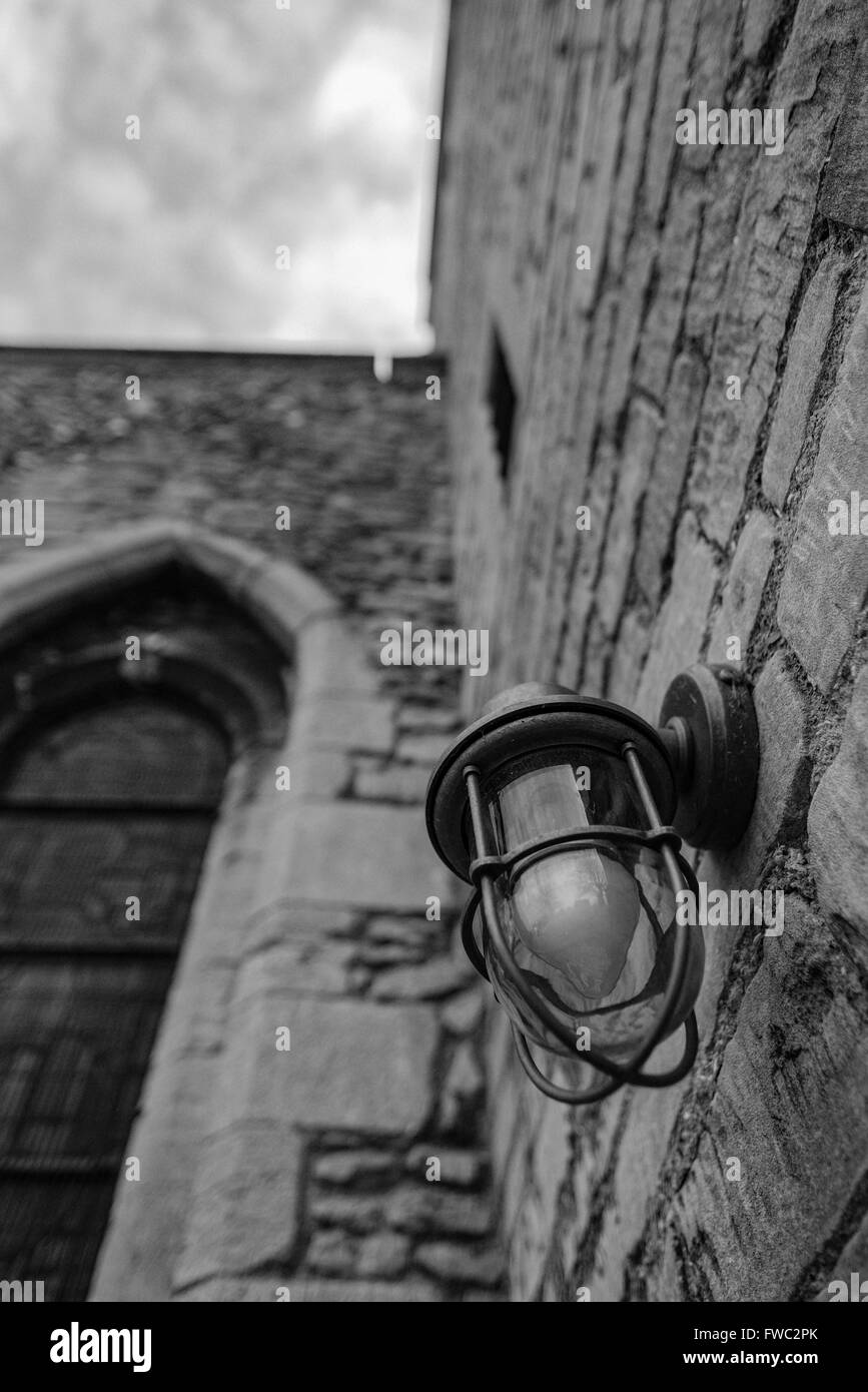 Installed security light seen installed on the side of an old church to ...