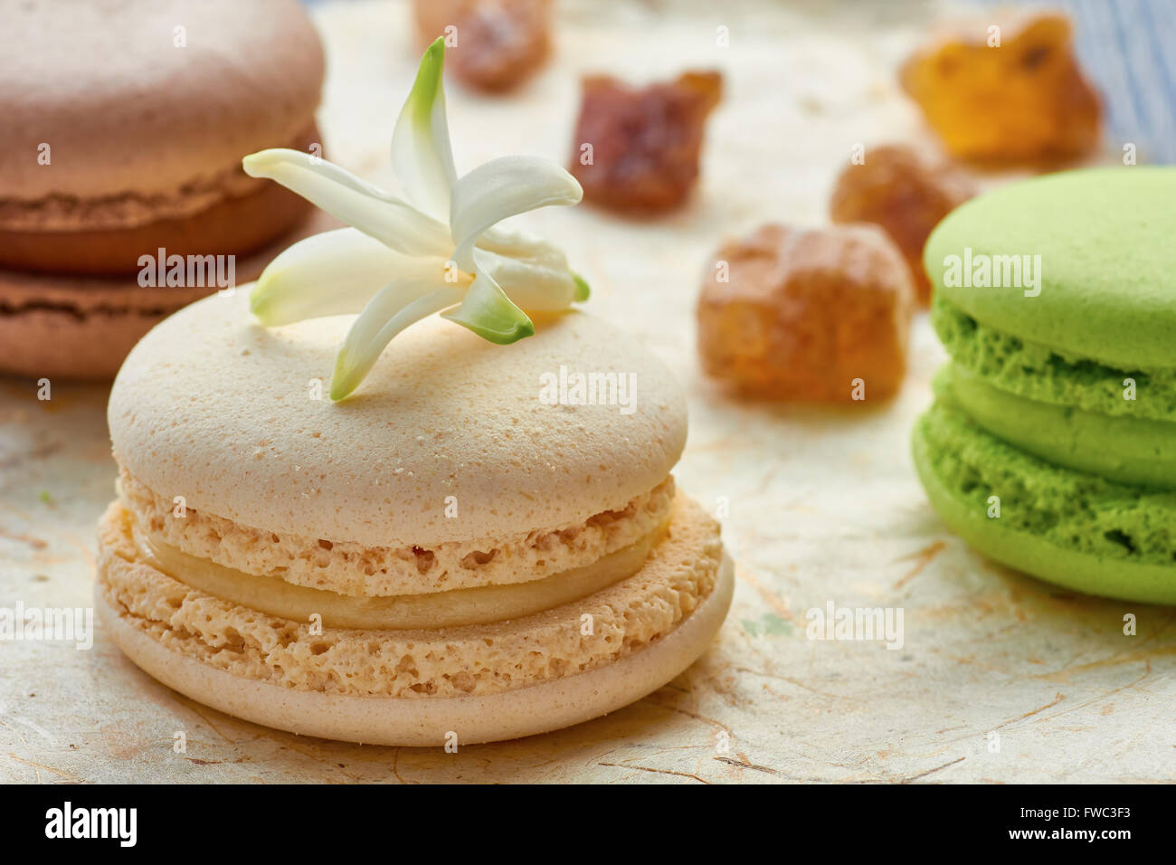 French white macaron on wrapping-paper Stock Photo - Alamy