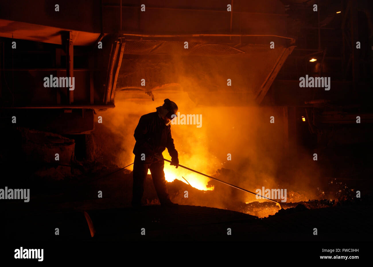 Team member taking iron samples using a lance on Blast Furnace No 5 at ...
