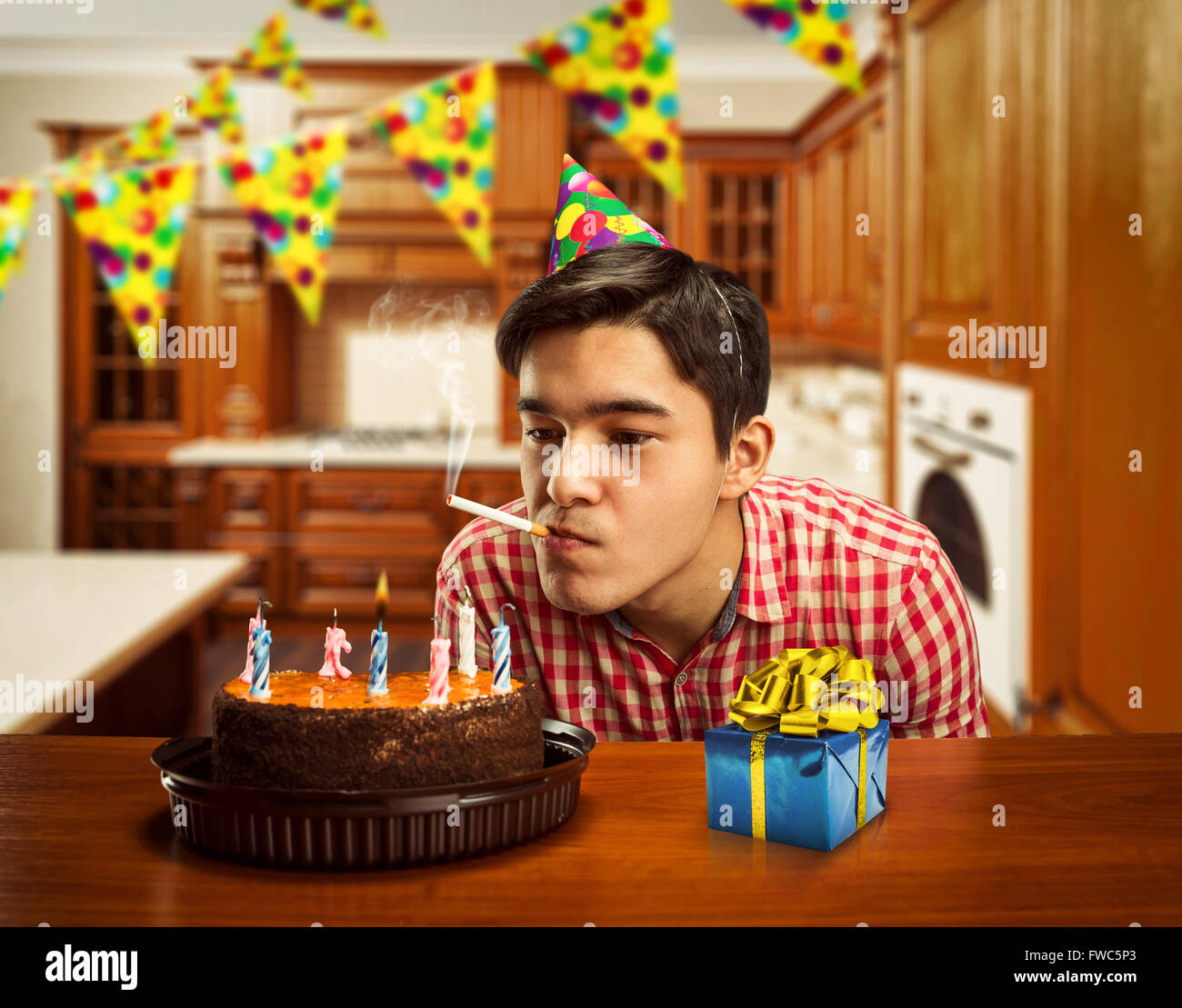 Birthday boy smoking Stock Photo - Alamy