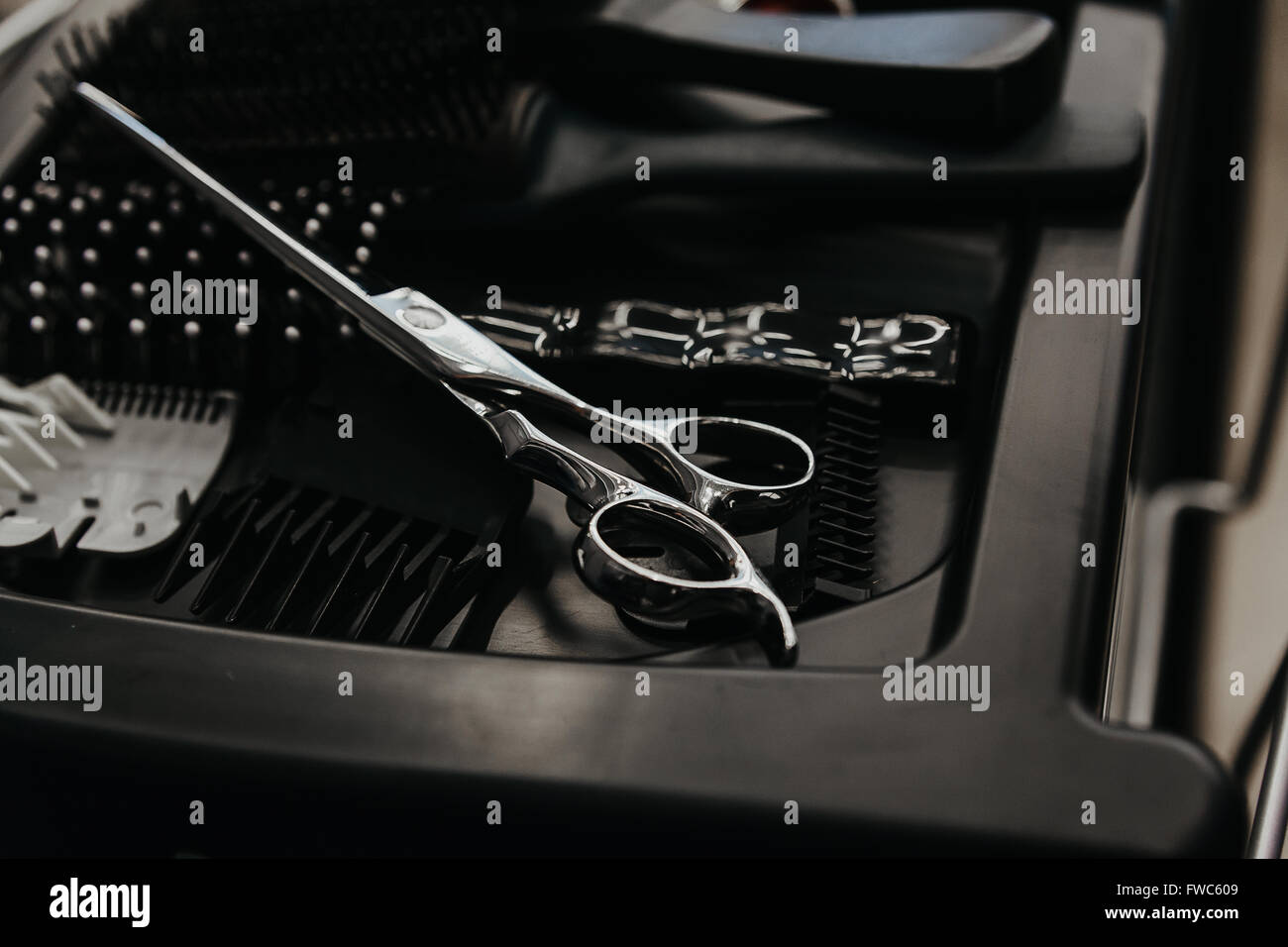 Professional hairdresser tools on table Stock Photo - Alamy