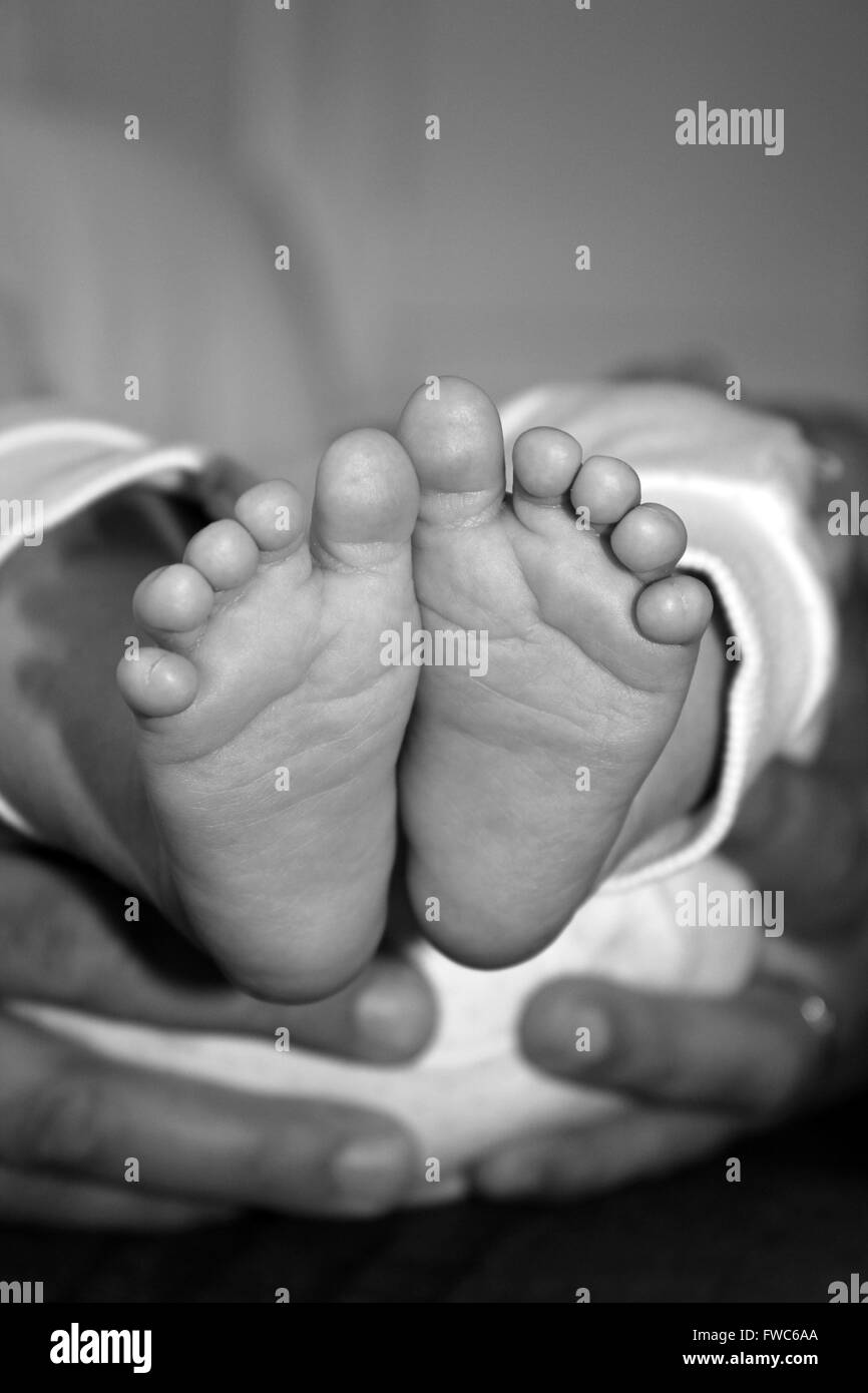 Baby curly toes hi-res stock photography and images - Alamy