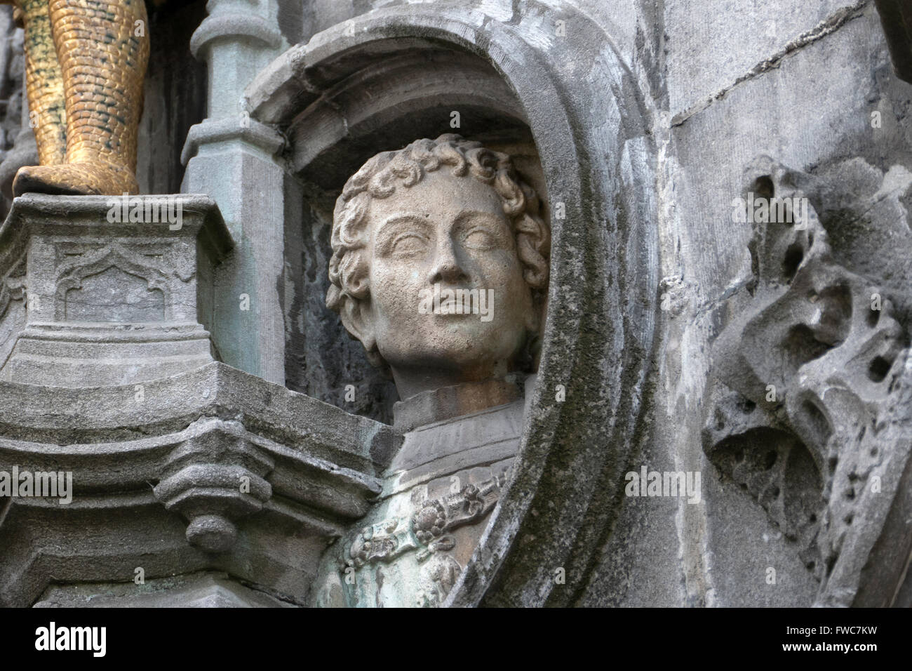Guilded stone statues at the Basilica of the Holy Blood in Bruges ...