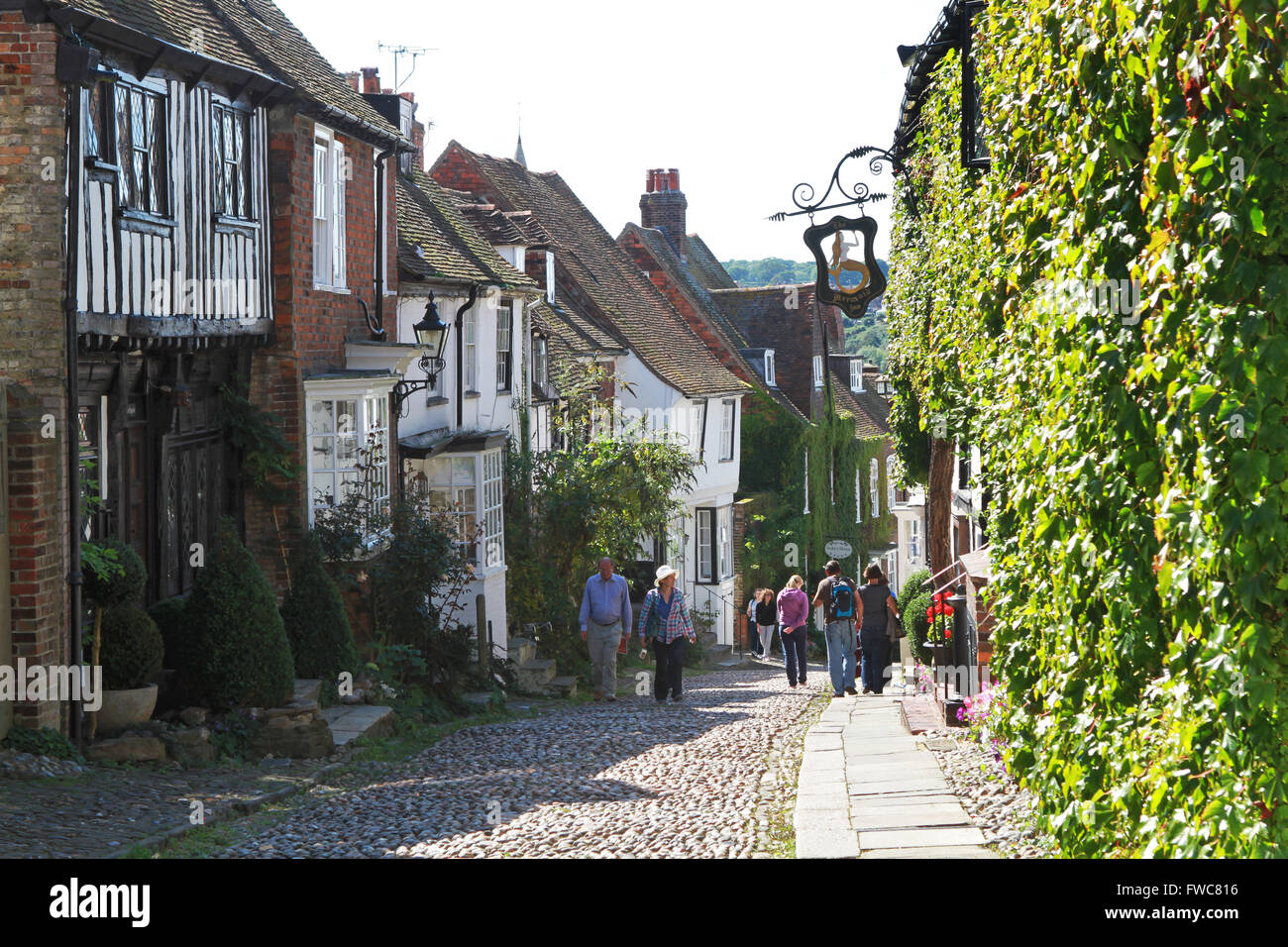 A summer day in Mermaid Street, Rye (Mermaid Inn on right). East Sussex ...