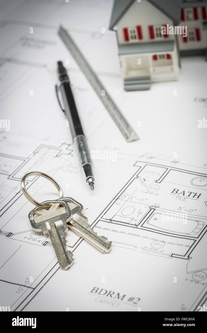 Model Home, Pencil, Ruler and Keys Resting On Custom House Plans Stock ...