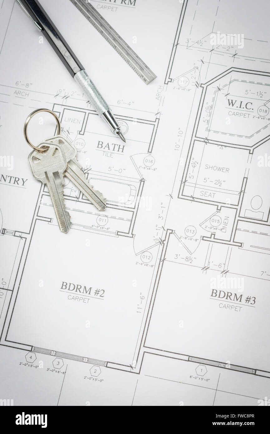Engineer Pencil, Ruler and Keys Resting On Custom House Plans Stock ...