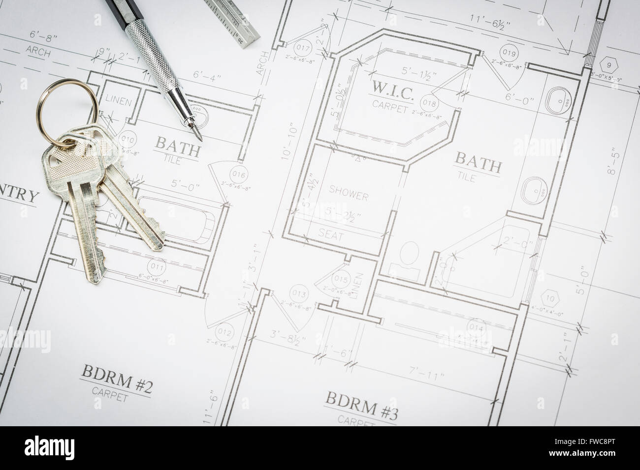 Engineer Pencil, Ruler and Keys Resting On Custom House Plans Stock ...